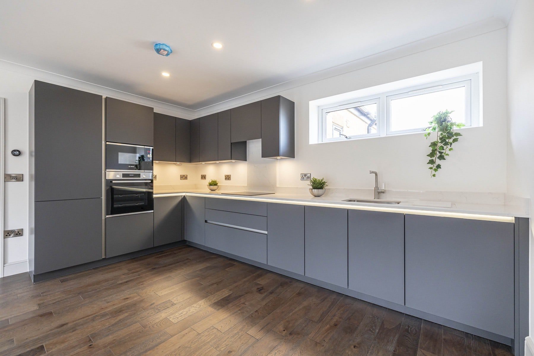 Ultra-Modern Kitchen In Urban Grey | Net Kitchens Direct